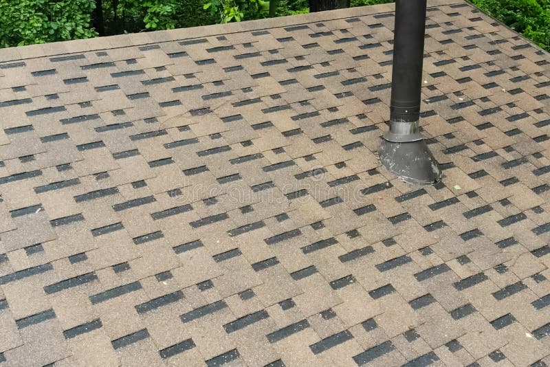 Bituminous Tile for a Roof. a Roof from a Bituminous Tile. Moder Stock ...