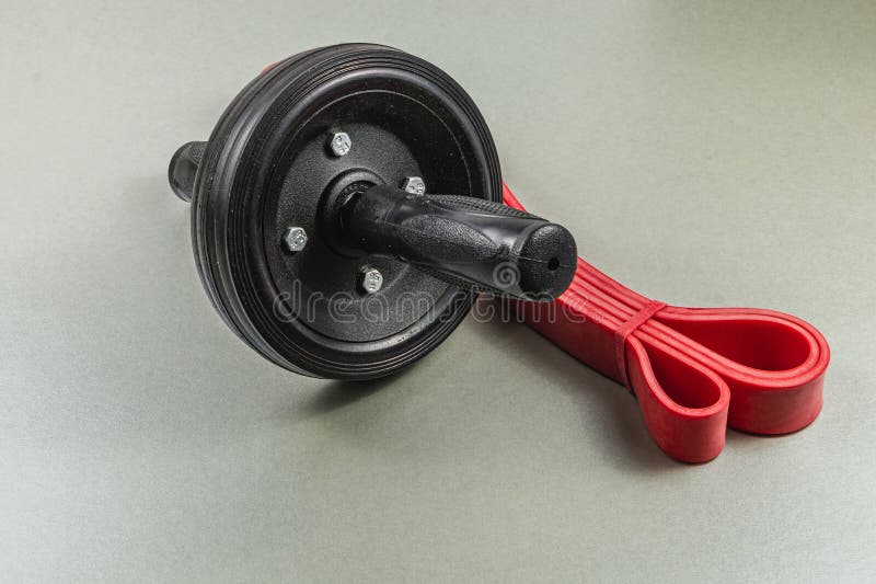 Fitness Equipment Includes an Ab Roller and Resistance Band Stock Image ...
