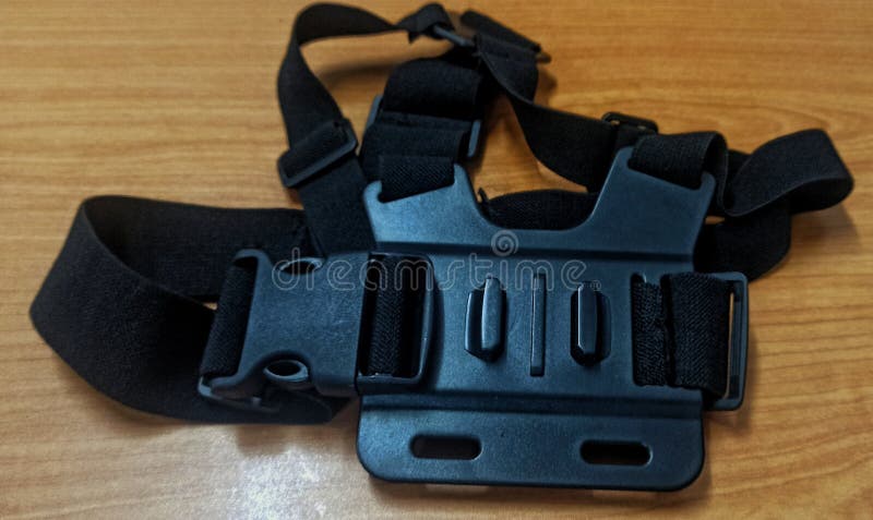 A Black Action Camera Mount, Featuring Adjustable Straps and Mounting ...