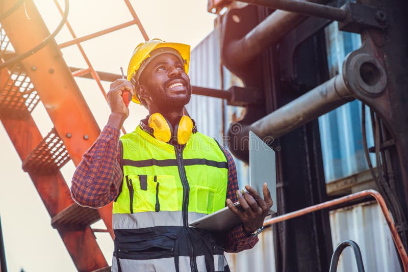 Black African Male Worker Working in Port Cargo Radio Control Loading ...