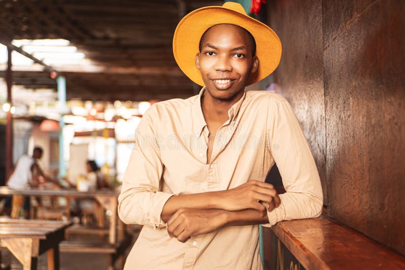 Black African Man with Hat Looking at Camera. Stock Image - Image of ...
