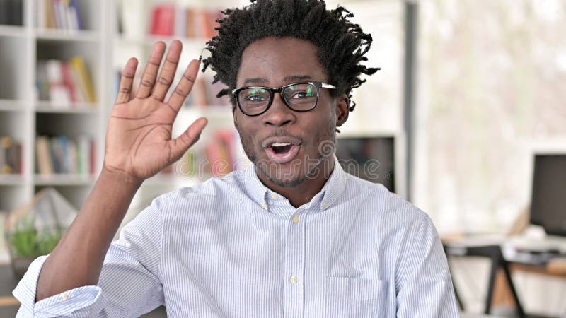 Young African Man Waving, Saying Hello Stock Image - Image of trader ...