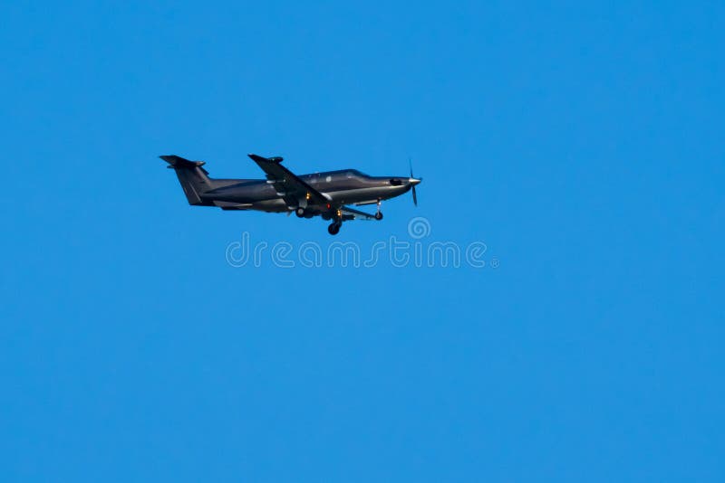 Black Airplane Flying in Blue Sky, One-engine Plane Stock Photo - Image ...