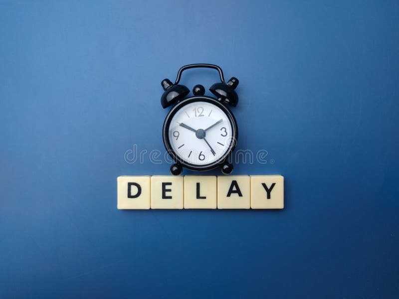 Black Alarm Clock with the Word DELAY Stock Image - Image of reminder ...