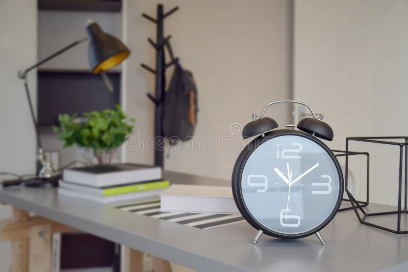 Black Alarm Clock on Work Table Stock Image - Image of notes, ambient ...