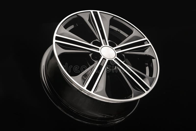 Black Alloy Wheel on Dark Background Close Up Stock Image - Image of ...