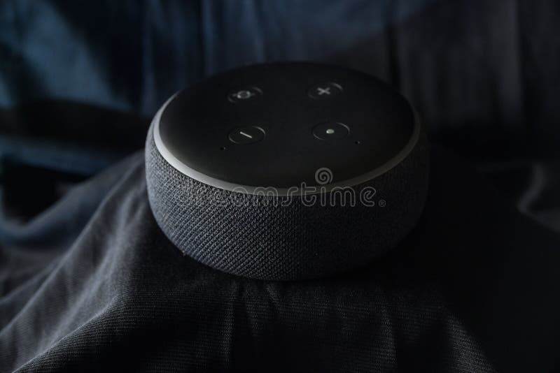Black Amazon Echo Dot with Alexa Assistant Isolated on a Black Material ...