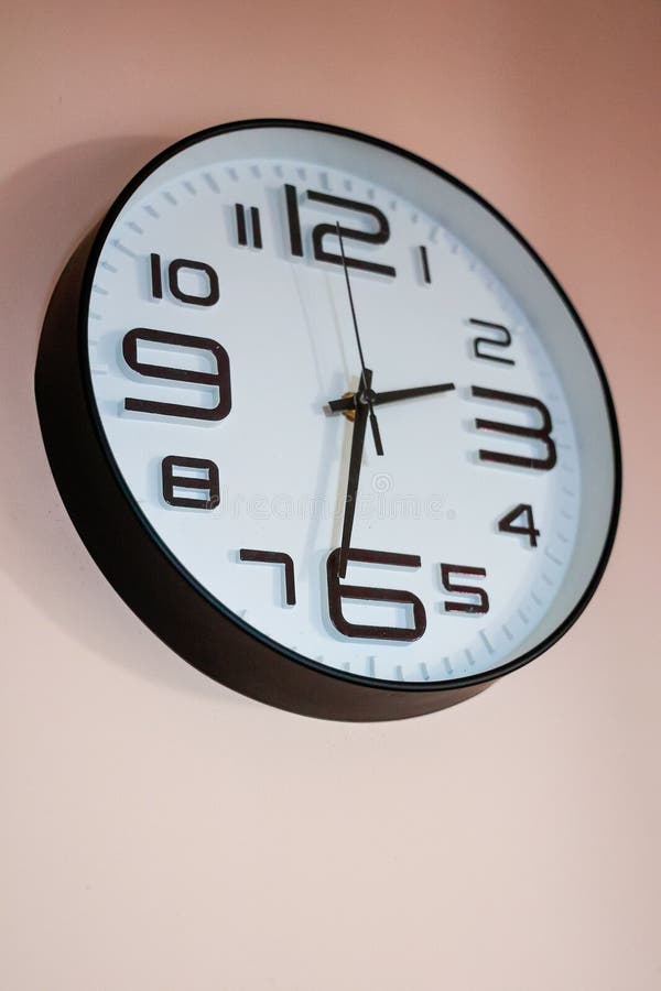 Black Analog Clock Mounted on a Wall Stock Photo - Image of timekeeping ...