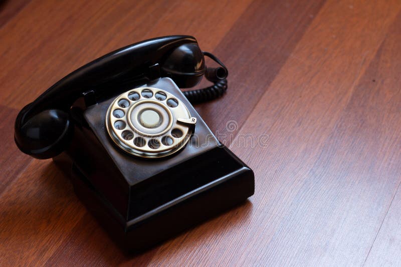 Black Analog Telephone on Wood Stock Image - Image of brown, contact ...