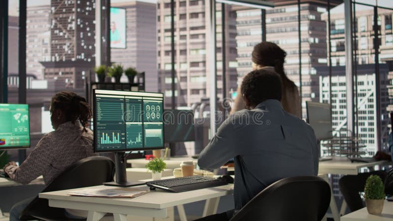 Black Analyst Working with Monthly Revenue Balance To Create Financial ...