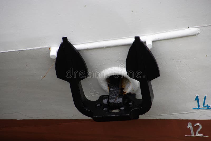 Black Anchor on a White Ship Hull Stock Image - Image of nautical ...