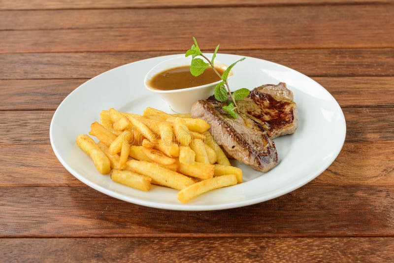 Black Angus Rump with Chips Stock Photo - Image of pepper, rosemary ...