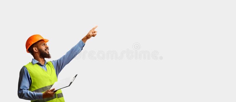 Black Architect Working on Construction Site Pointing Finger, White ...
