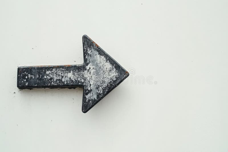 Decorative Black Arrow Pointing To the Right on a Textured White ...