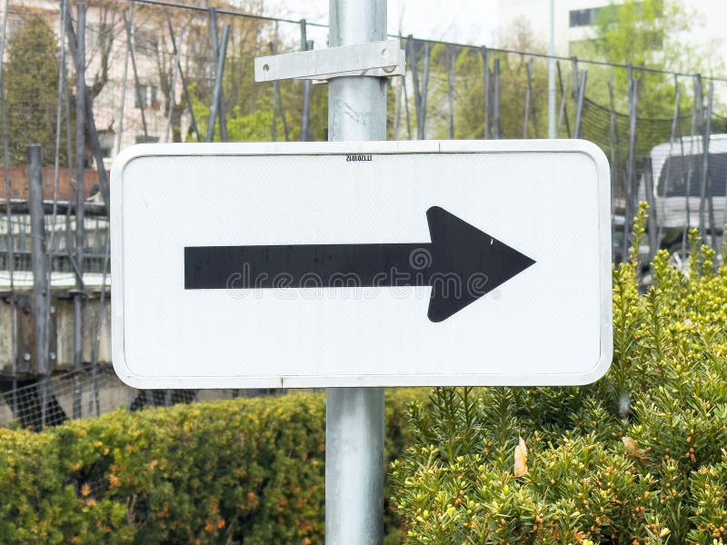 Black Arrow Traffic Sign in Urban Setting Pointing Right Editorial ...