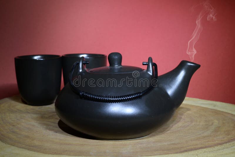 Black Asian Teapot with Steam Coming Out Stock Photo - Image of steam ...