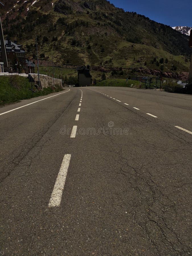 Black Asphalt Road and White Dividing Lines Stock Photo - Image of ...