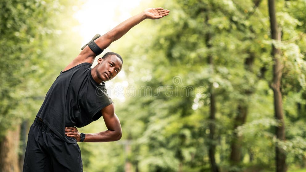 Black Guy Stretching His Body, Making Sport Outdoors Stock Photo ...