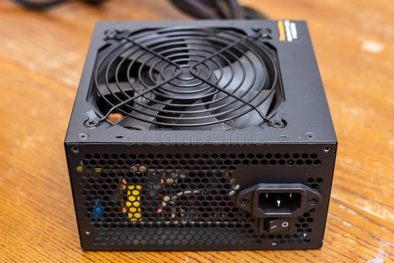 Black ATX PC Power Supply Unit on Wooden Surface Stock Image - Image of ...
