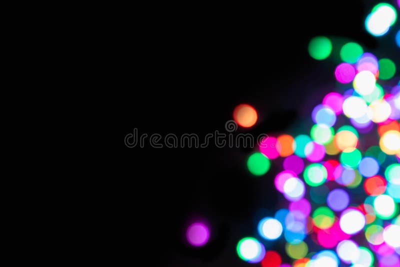 Black Background with Defocused Colored Lights on the Right Side with ...