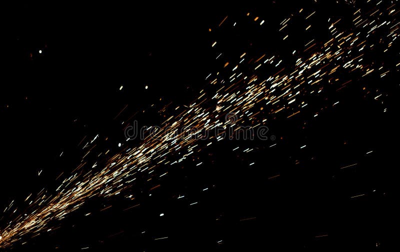 A Black Background with a Long Stream of Sparks Stock Photo - Image of ...