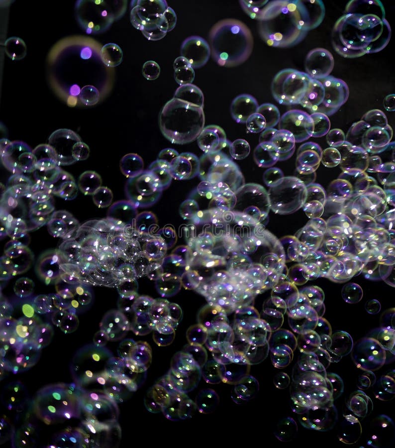 Black Background and Many Bubbles. Small and Big Bubbles Float in the ...