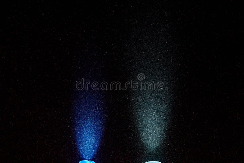 On a Black Background in Red Grain Blue and Gray Rays of Light Stock ...