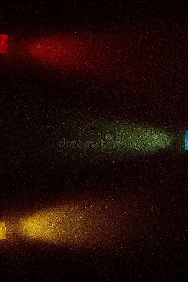 On a Black Background in Red Grain Parallel Rays of Red Green and ...