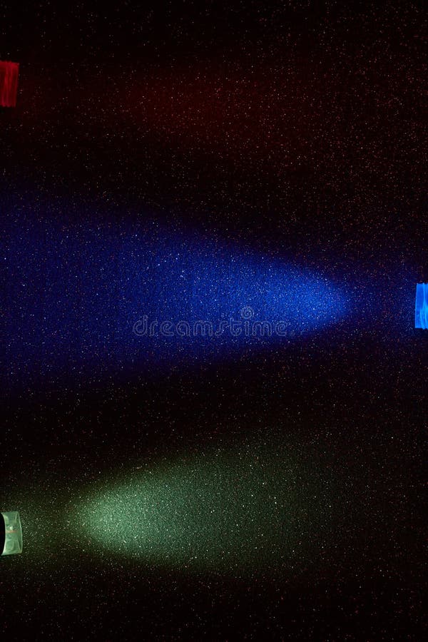 On a Black Background in Small Multi-colored Grain Parallel Rays of Red ...