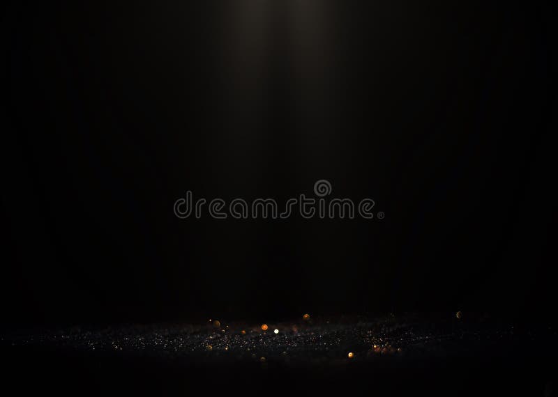 Black Background with Spotlight To Luxurious Gold Glitter Sparkling ...