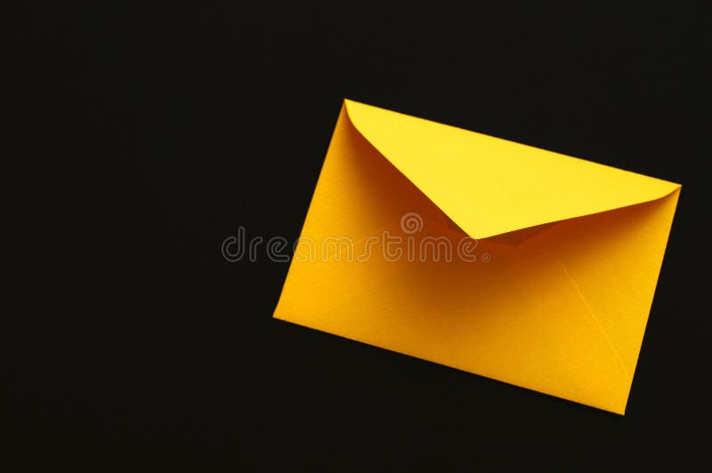 Yellow Envelope on Black Background Stock Image - Image of font, orange ...