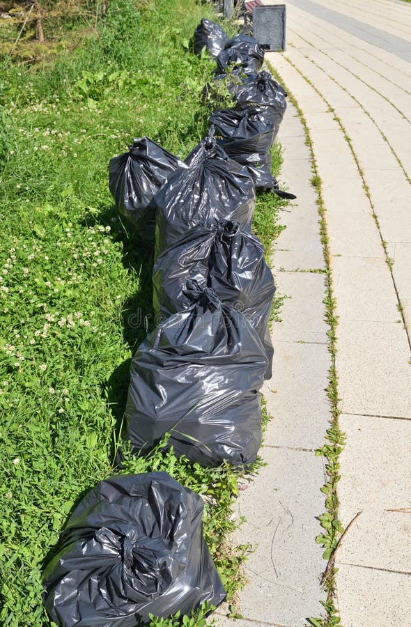 Black Bags Garbage Line Sidewalk Stock Photos - Free & Royalty-Free ...