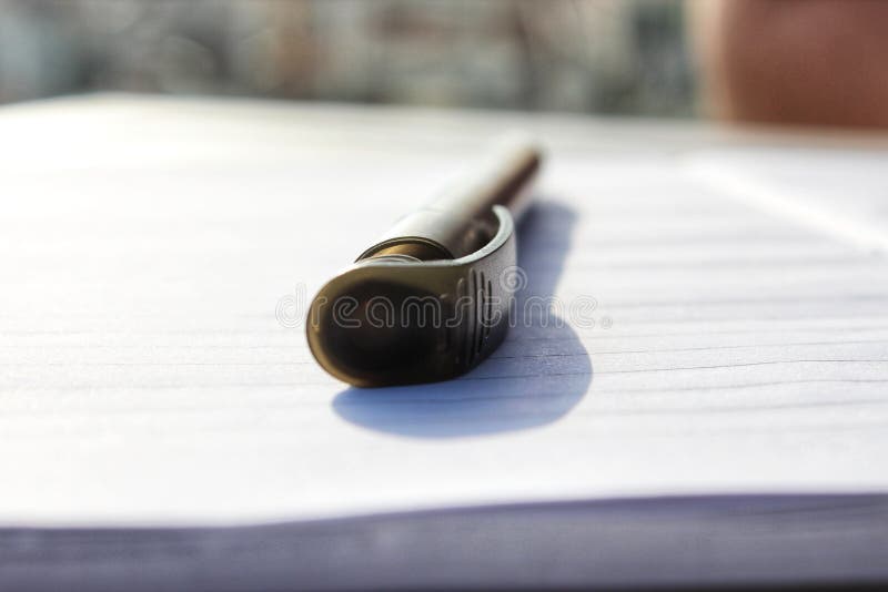 Black Ballpoint Pen Lying on Blank Page Stock Photo - Image of ballpen ...