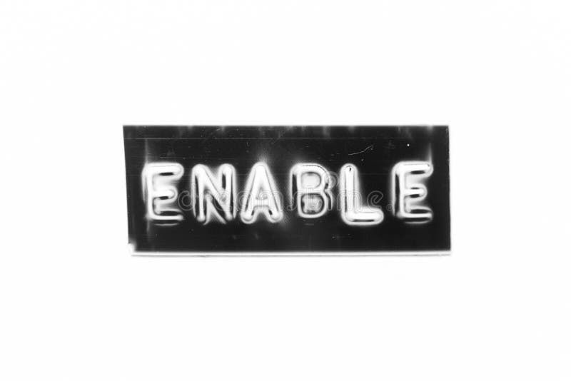 Black Banner that Have Embossed Letter with Word Enable on White Paper ...