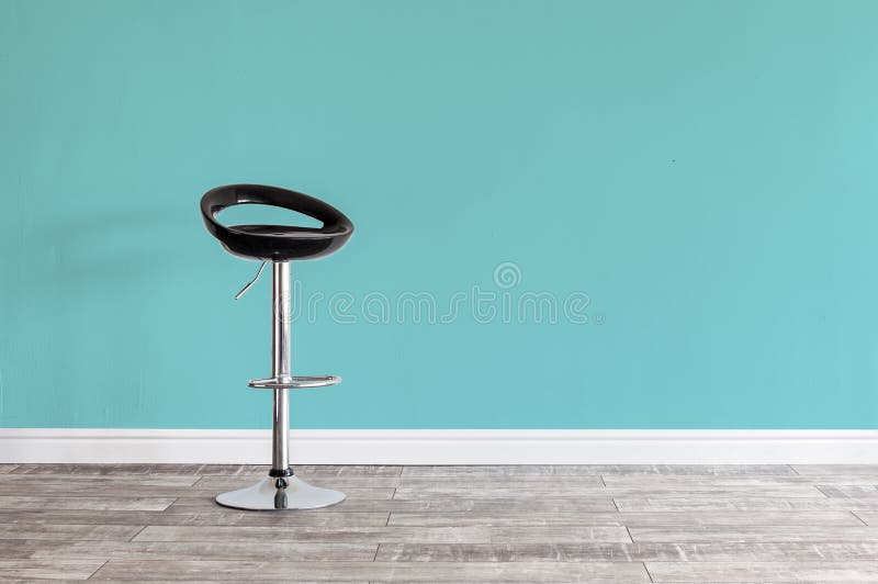 Black Bar Stool in Front of Wall. Stock Photo - Image of decoration ...