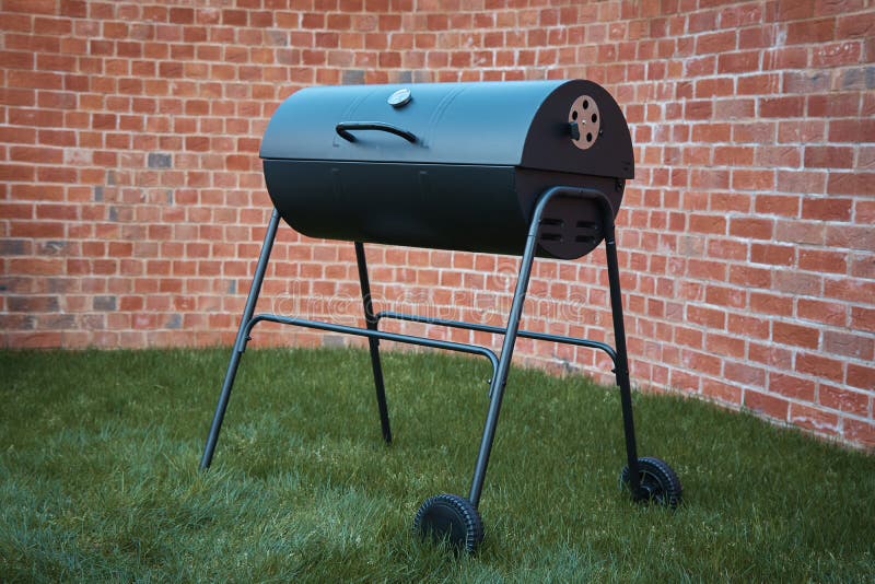 Black barrel grill. stock image. Image of closed, isolated - 118551455