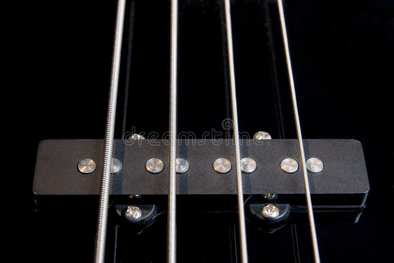 Black Bass Guitar Pickup with Strained Strings Stock Photo - Image of ...