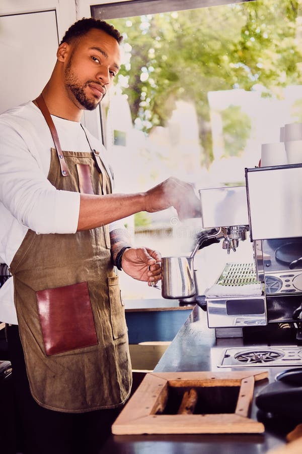 Black Bearded Coffee Seller Pouring Coffee. Stock Image - Image of ...
