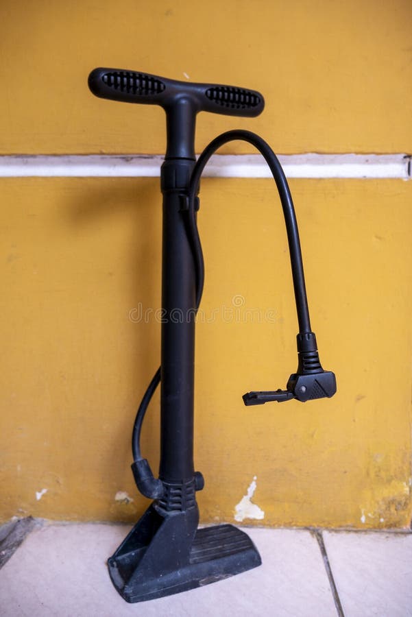 Old car tire pump stock image. Image of single, wheel - 27187881