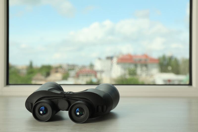 Black Binoculars on White Wooden Window Sill. Space for Text Stock ...