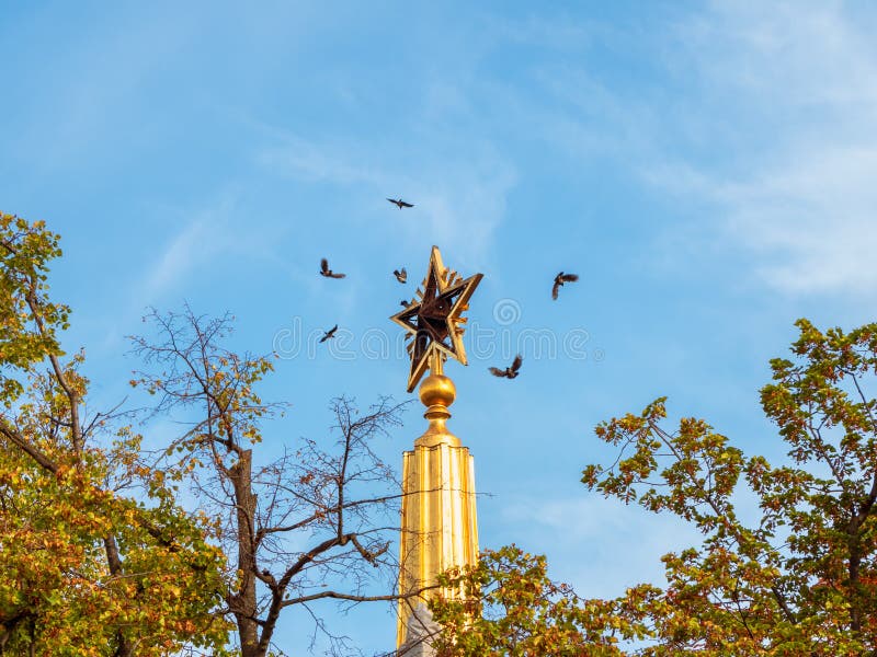 Black Birds Fly Around the Spire, VDNH, Moscow. Stock Image - Image of ...