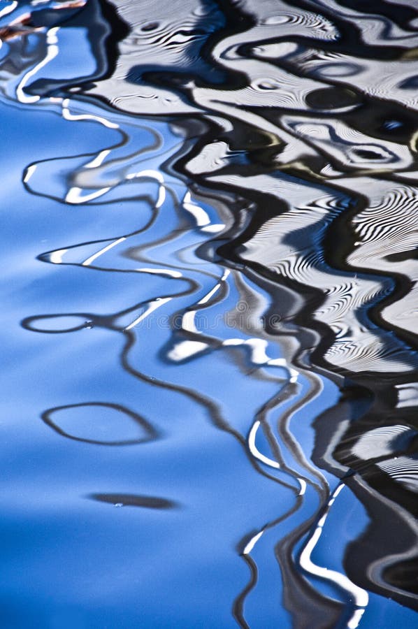 Black and Blue Water Reflection Stock Image - Image of seacoast ...