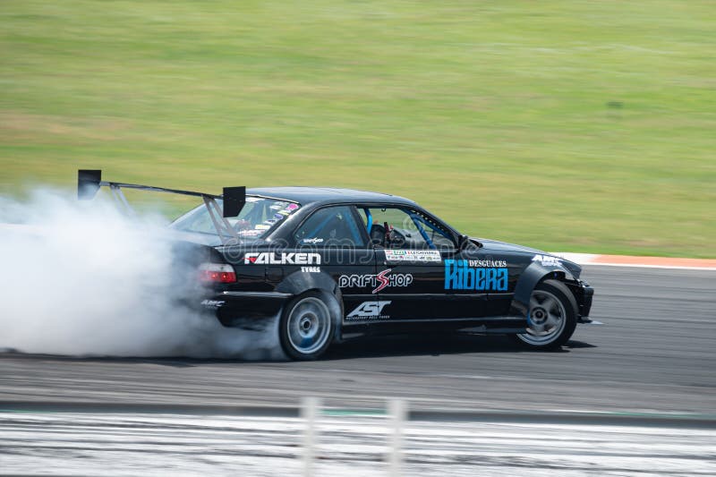 Black BMW E36 Producing Smoke on a Trail for a Drift Competition ...