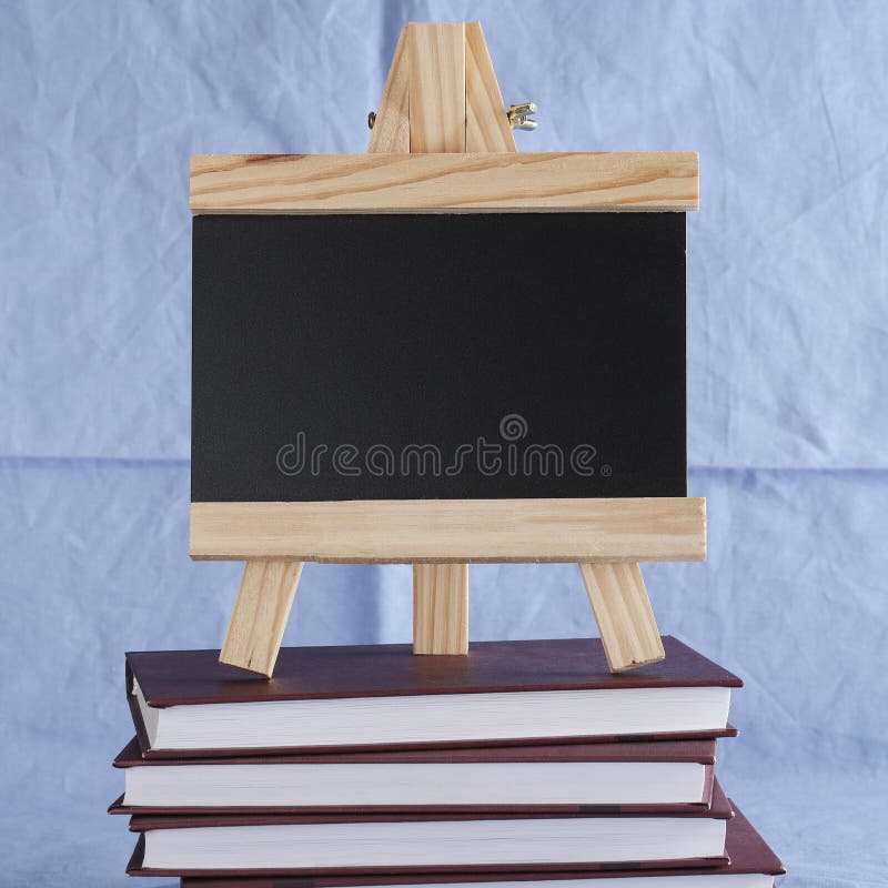Old Books on Blue Wall Background - Education Concept. Stock Photo ...