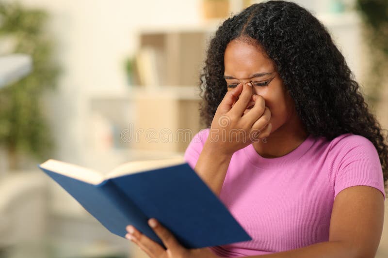 Black Book Reader Suffering Eyestrain at Home Stock Image - Image of ...