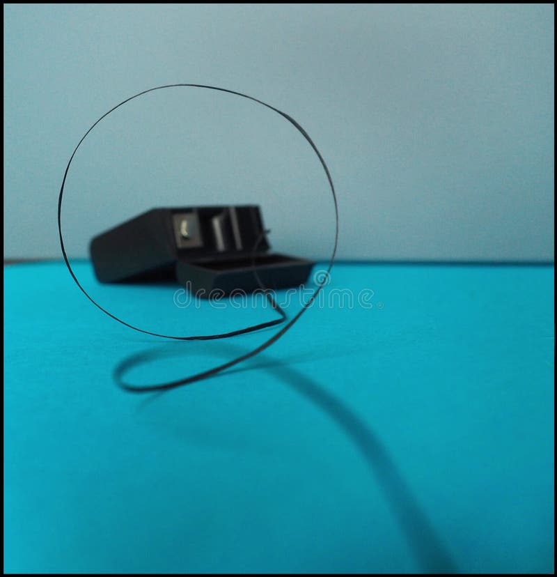 The Black Box Seen through the Floss Loop. Stock Photo - Image of lasso ...