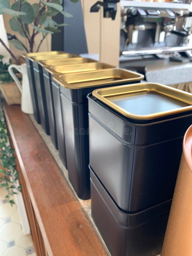 Black Box Stack Line Up in Coffee Cafe Stock Image - Image of metal ...