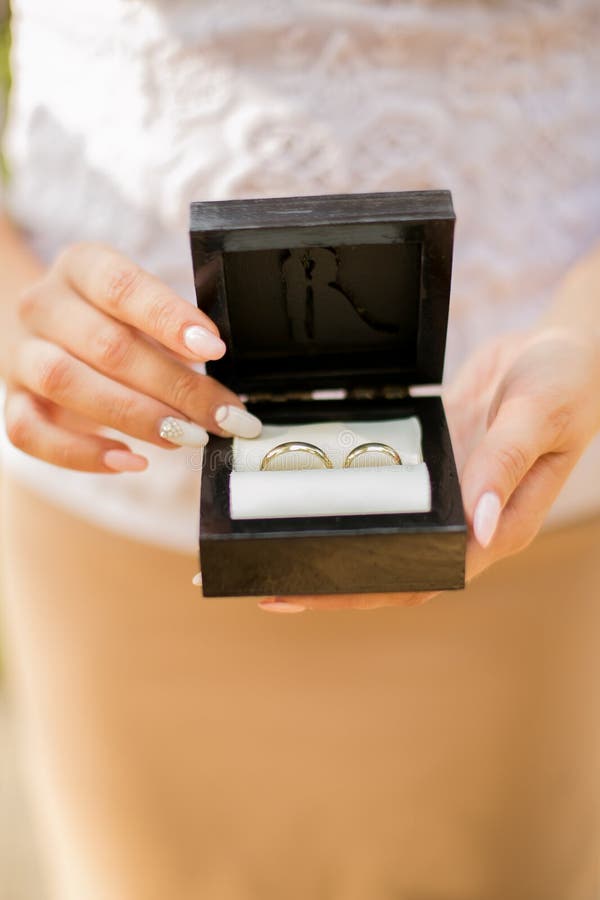 Black Box for Wedding Rings with the Newlyweds Stock Photo - Image of ...