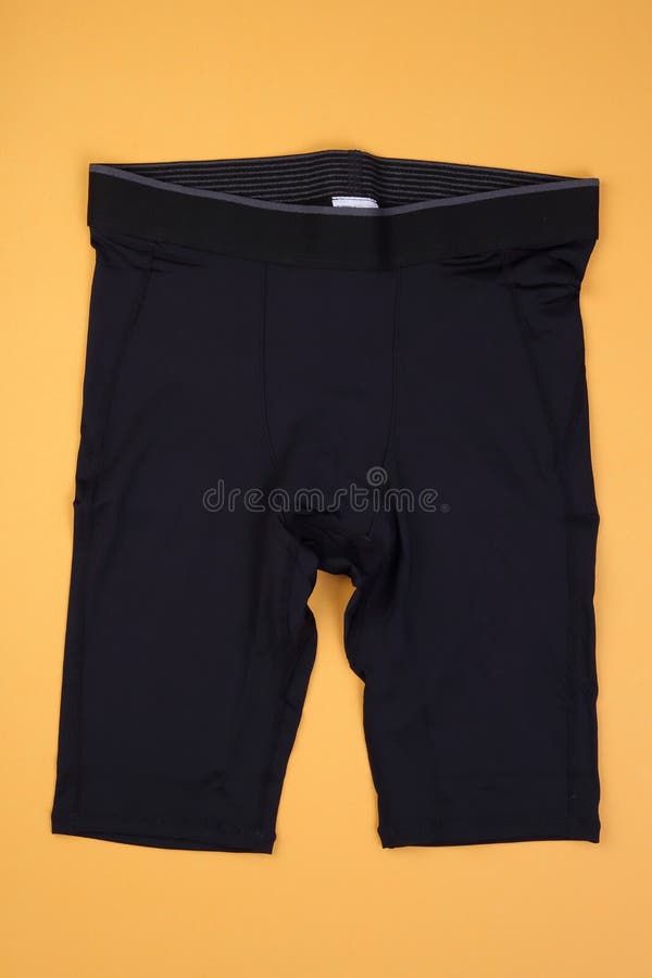 Black Boxer Briefs on Orange Background Stock Image - Image of fitness ...