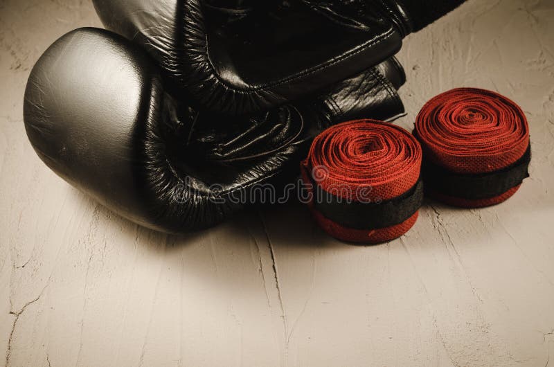 Black Boxing Gloves and Red Bandage Black Boxing Gloves and Red Bandage ...